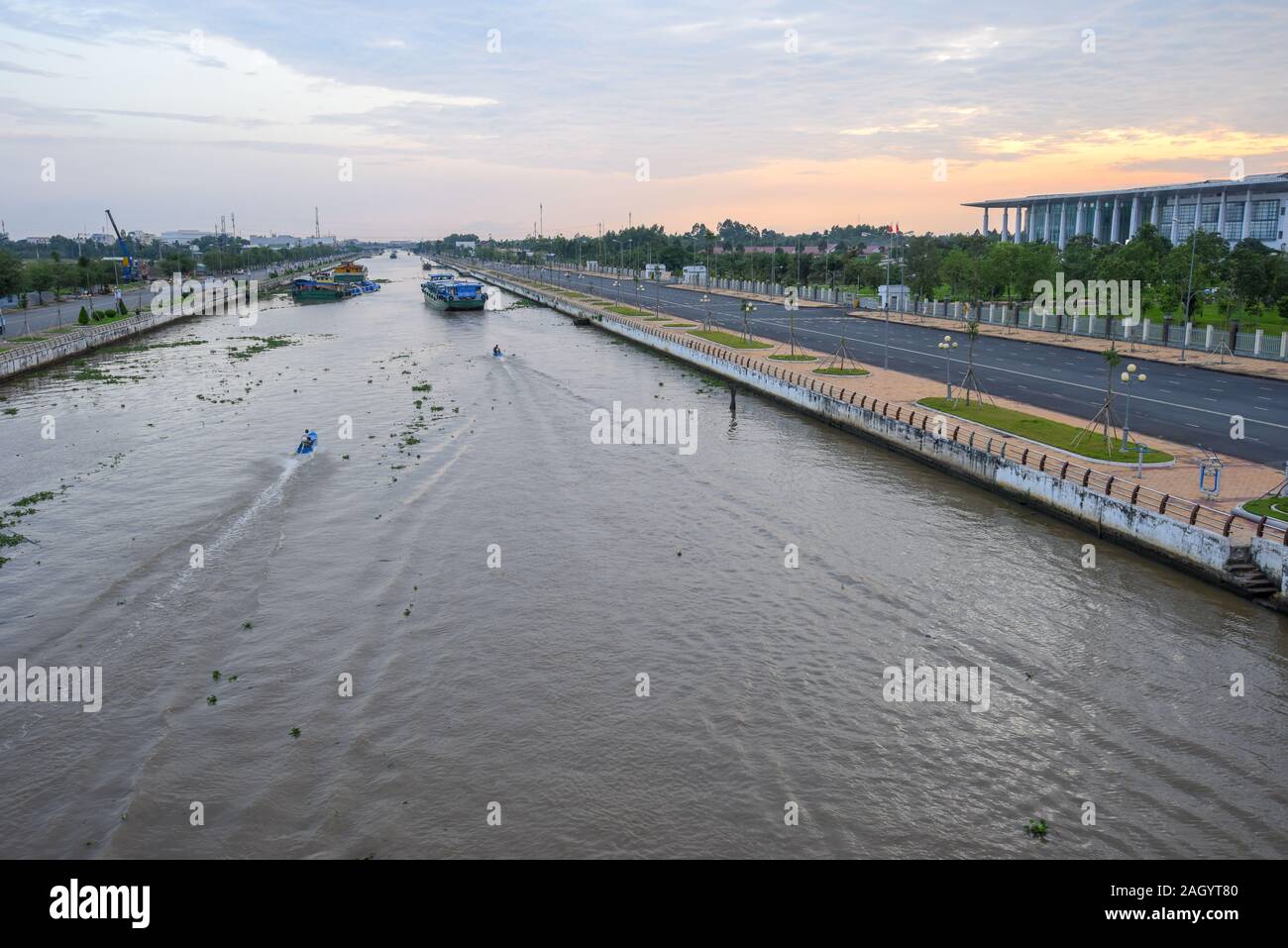 boat carry fruit on Xa No river in Hau Giang Stock Photo - Alamy