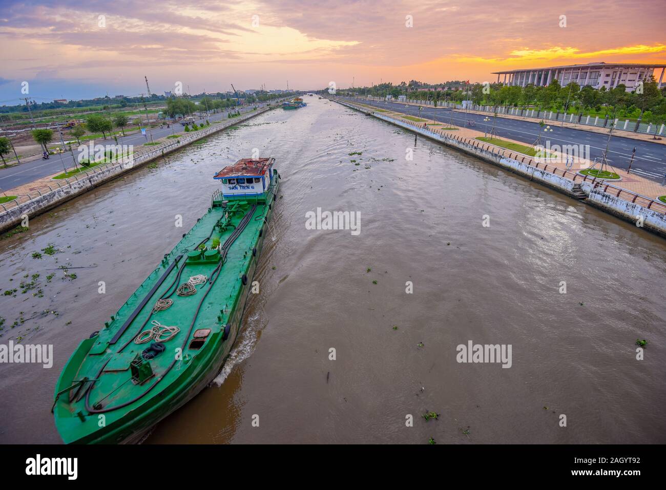 boat carry fruit on Xa No river in Hau Giang Stock Photo - Alamy