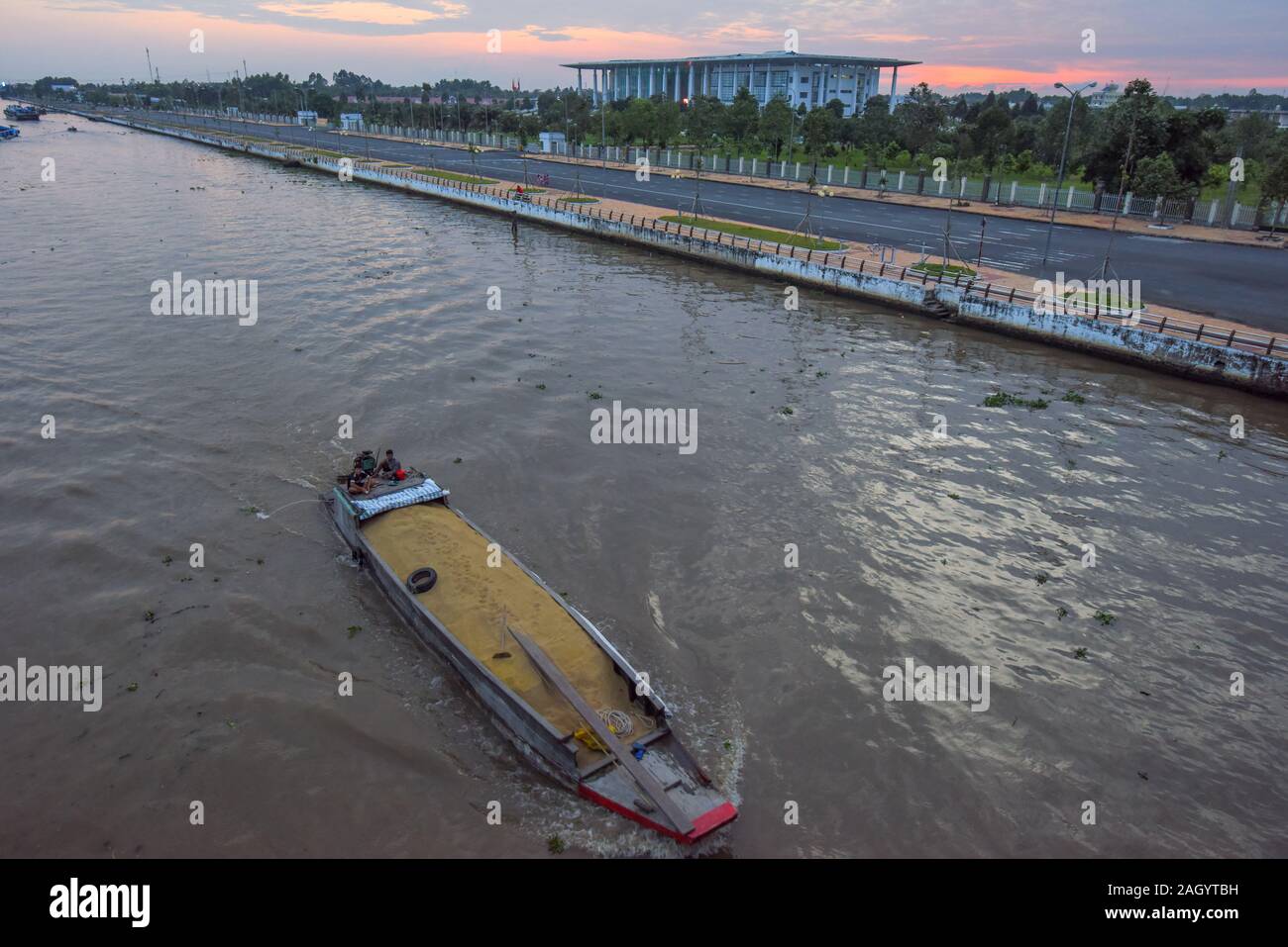 boat carry fruit on Xa No river in Hau Giang Stock Photo - Alamy