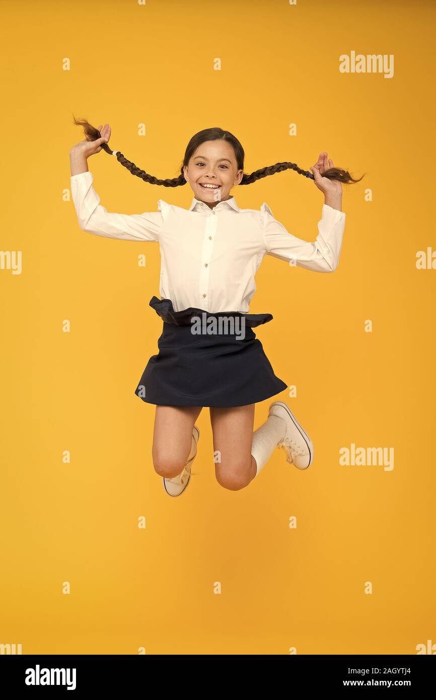 happy child jumping in school uniform. having fun. time for fun. school ...