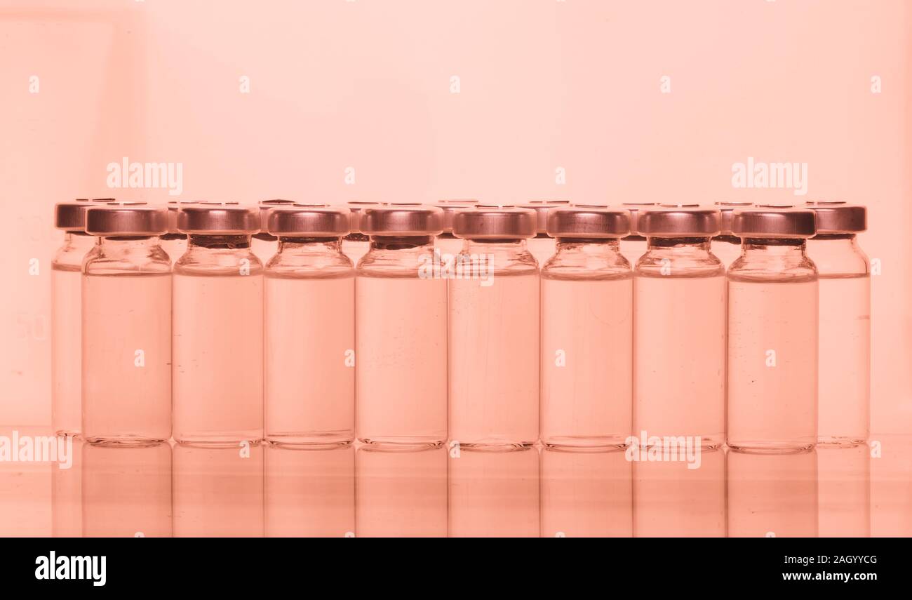 Glass medical ampoule vial for injection. Medicine is liquid sodium ...