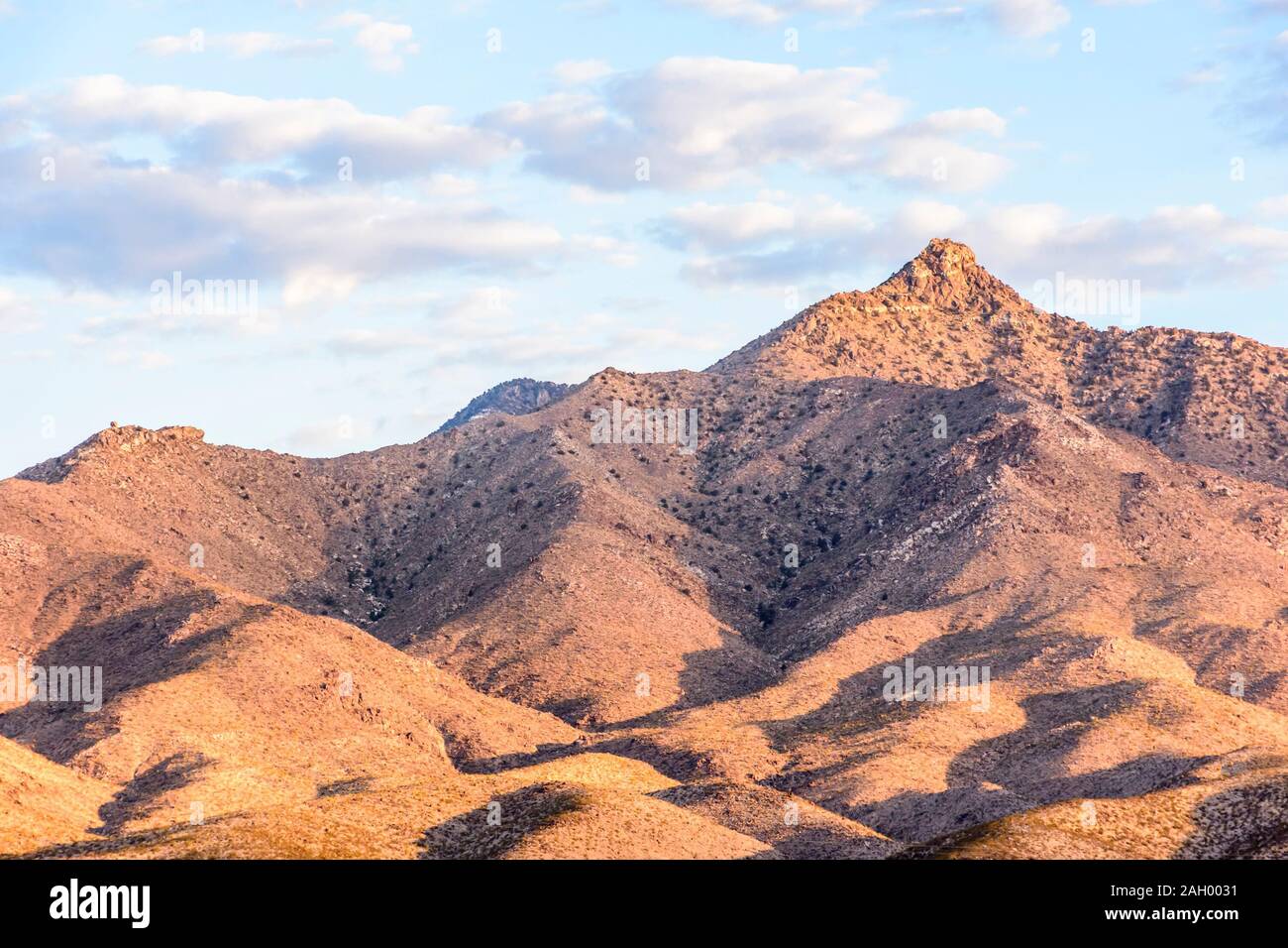 Rocky desert mountain landscape at sunset, Mojave Desert, California ...