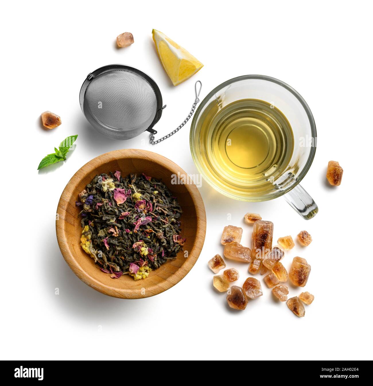Green tea with natural aromatic additives and accessories. Top view on ...