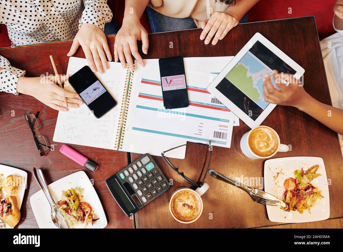 Female friend having lunch in cafe, making plans and discussing ...
