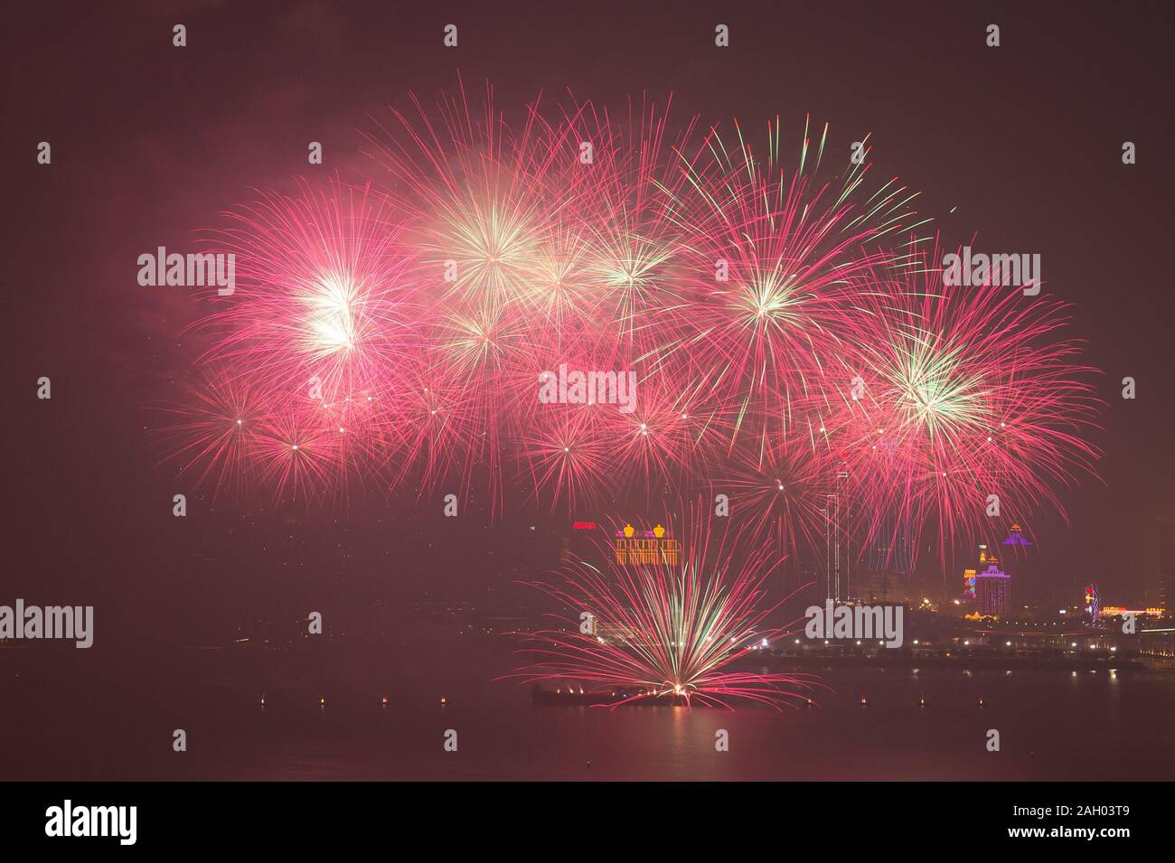 Beijing, China. 22nd Dec, 2019. Fireworks explode over the sky in south ...