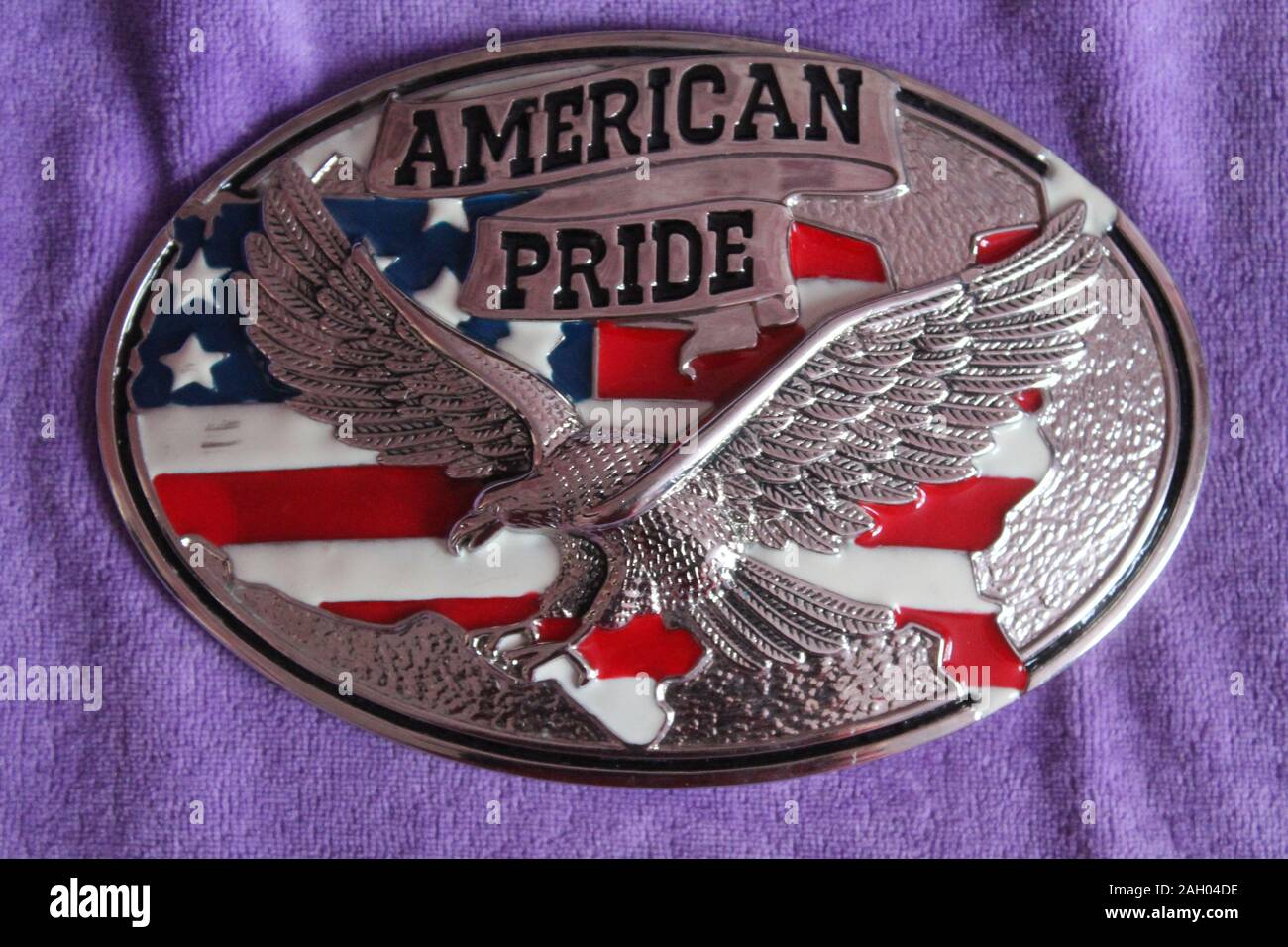 american metal plate on belt with symbols of freedom Stock Photo - Alamy