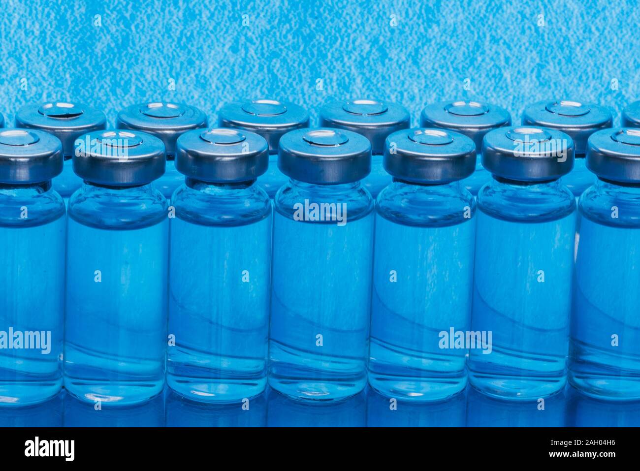 Glass medical ampoule vial for injection. Medicine is liquid sodium ...