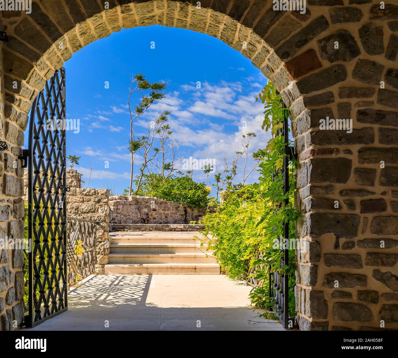 Picturesque stone walls and arched gate of the 15th century Citadel in ...