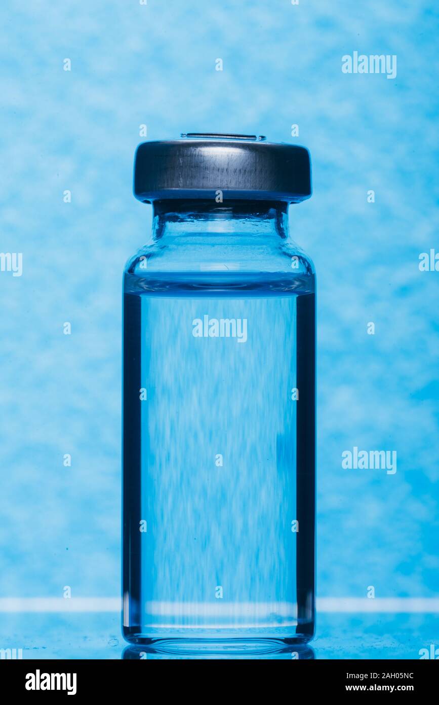 Glass medical ampoule vial for injection. Medicine is liquid sodium ...