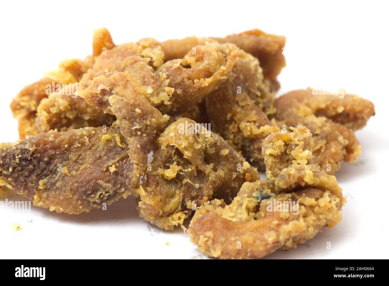 Fried Crispy Chiken Skin isolated on white background Stock Photo - Alamy