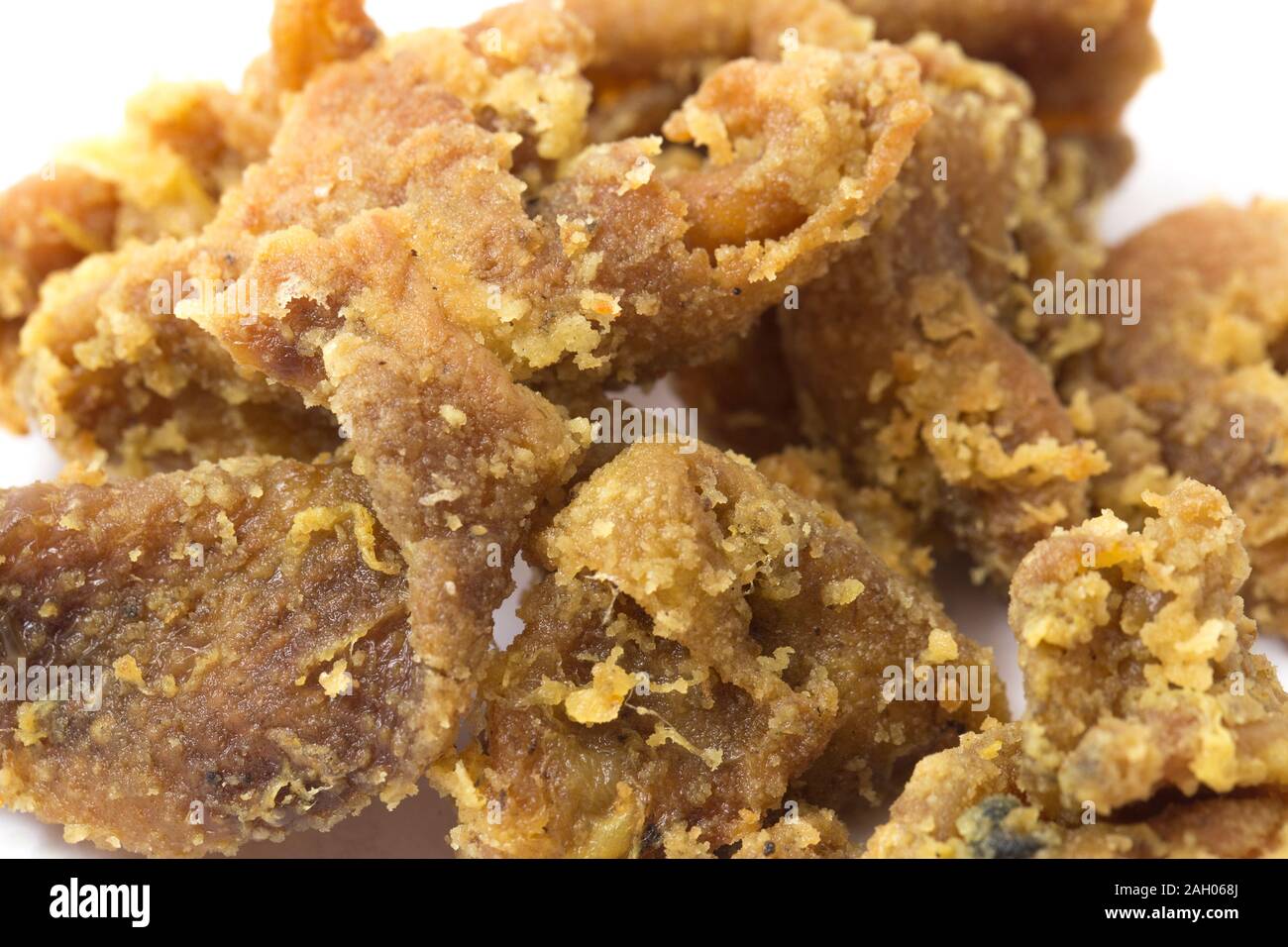 Fried Crispy Chiken Skin isolated on white background Stock Photo - Alamy