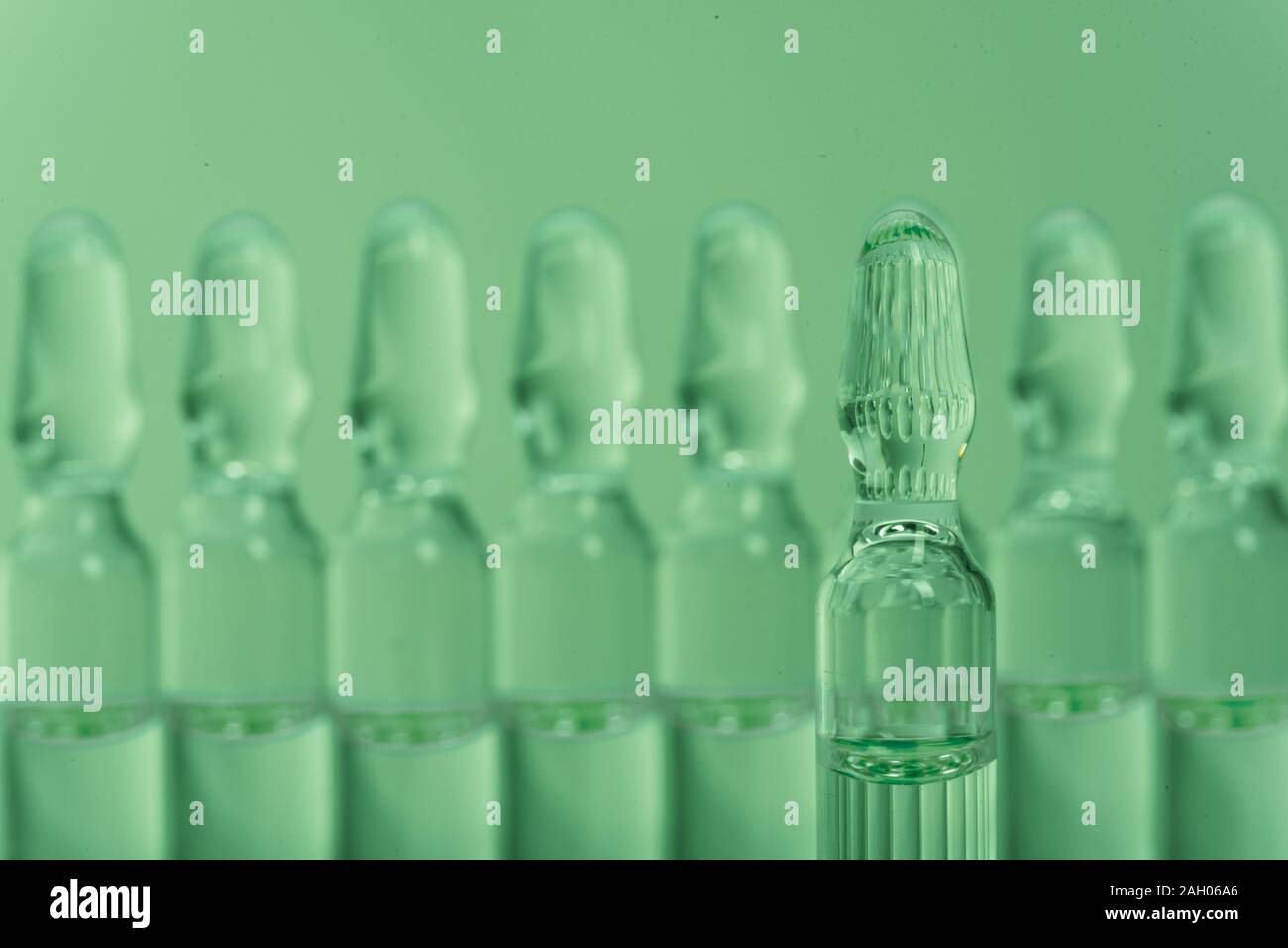 Glass medical ampoule vial for injection. Medicine is liquid sodium ...