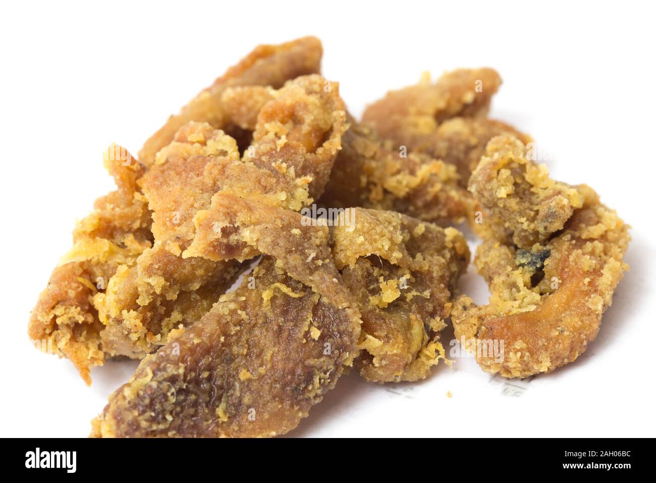 Fried Crispy Chiken Skin isolated on white background Stock Photo - Alamy