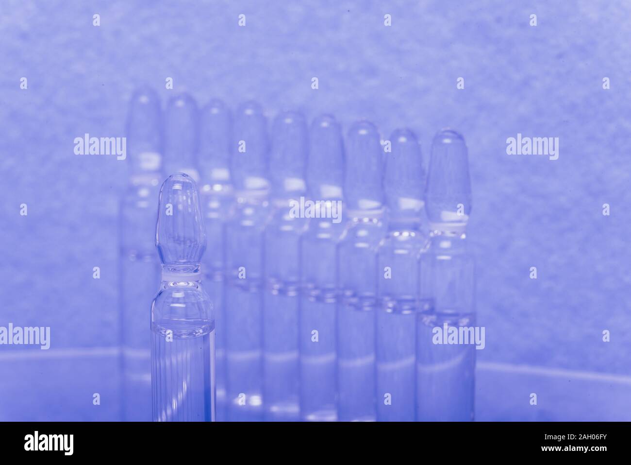 Glass medical ampoule vial for injection. Medicine is liquid sodium ...
