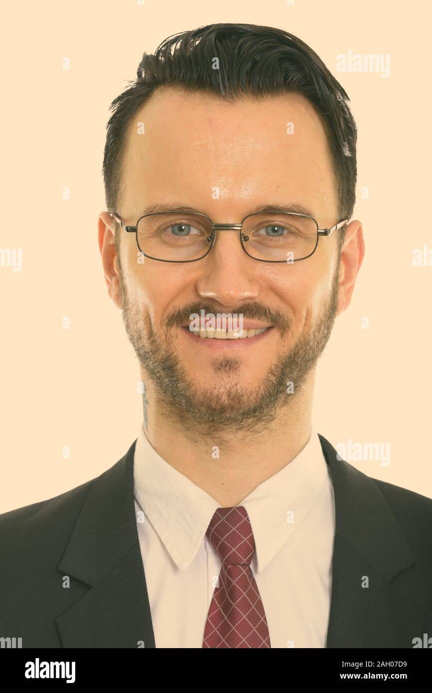 Portrait Smiling Businessman Beard Wearing Glasses Hi Res Stock
