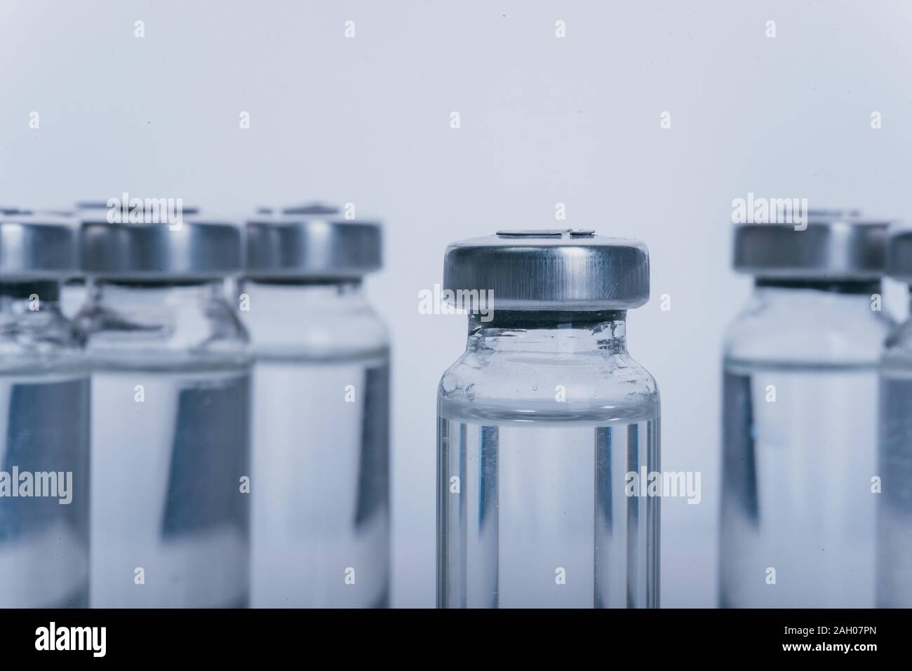 Glass medical ampoule vial for injection. Medicine is dry white drug ...