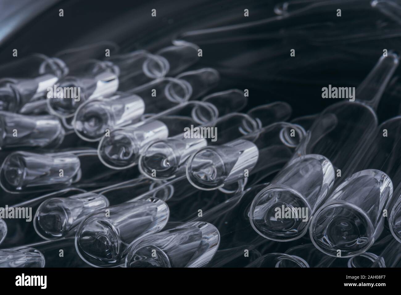 Glass medical ampoule vial for injection. Medicine is liquid sodium ...