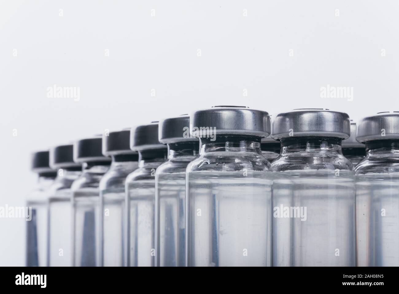 Glass medical ampoule vial for injection. Medicine is dry white drug ...