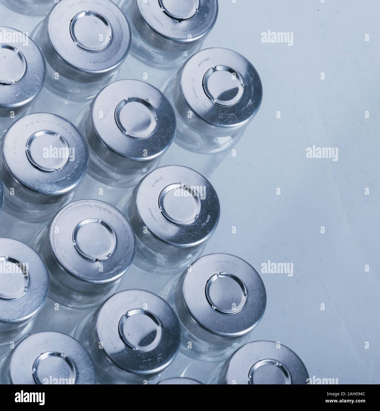 Glass medical ampoule vial for injection. Medicine is dry white drug ...