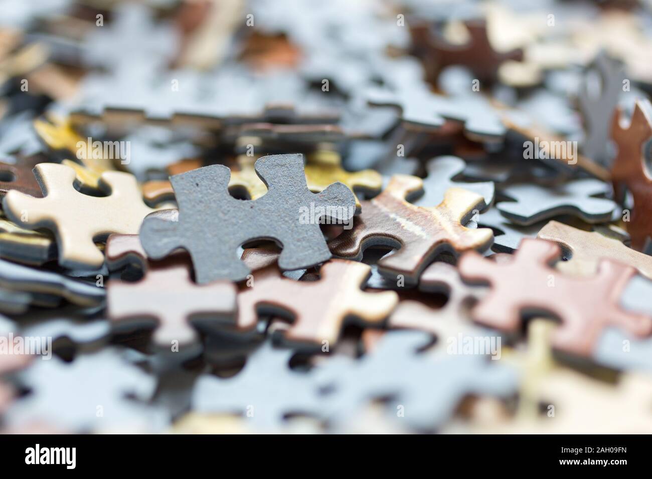 Mixed jigsaw puzzle pieces background, macro close up Stock Photo - Alamy