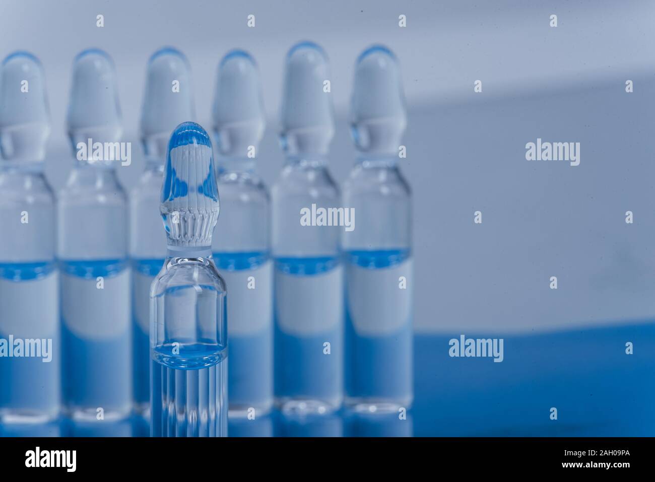 Glass medical ampoule vial for injection. Medicine is liquid sodium ...