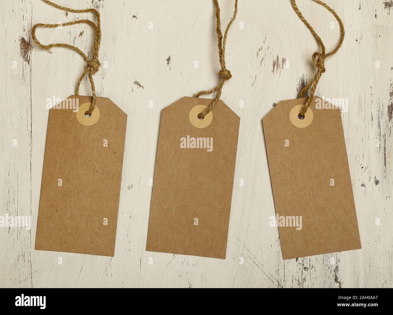 wooden background with cardboard label stickers Stock Photo - Alamy