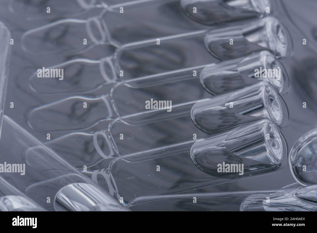 Glass medical ampoule vial for injection. Medicine is liquid sodium ...