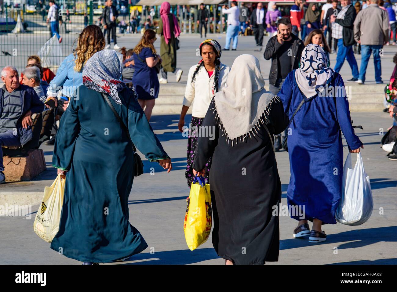 Women with traditional clothes walking on street in Istanbul, Turkey ...