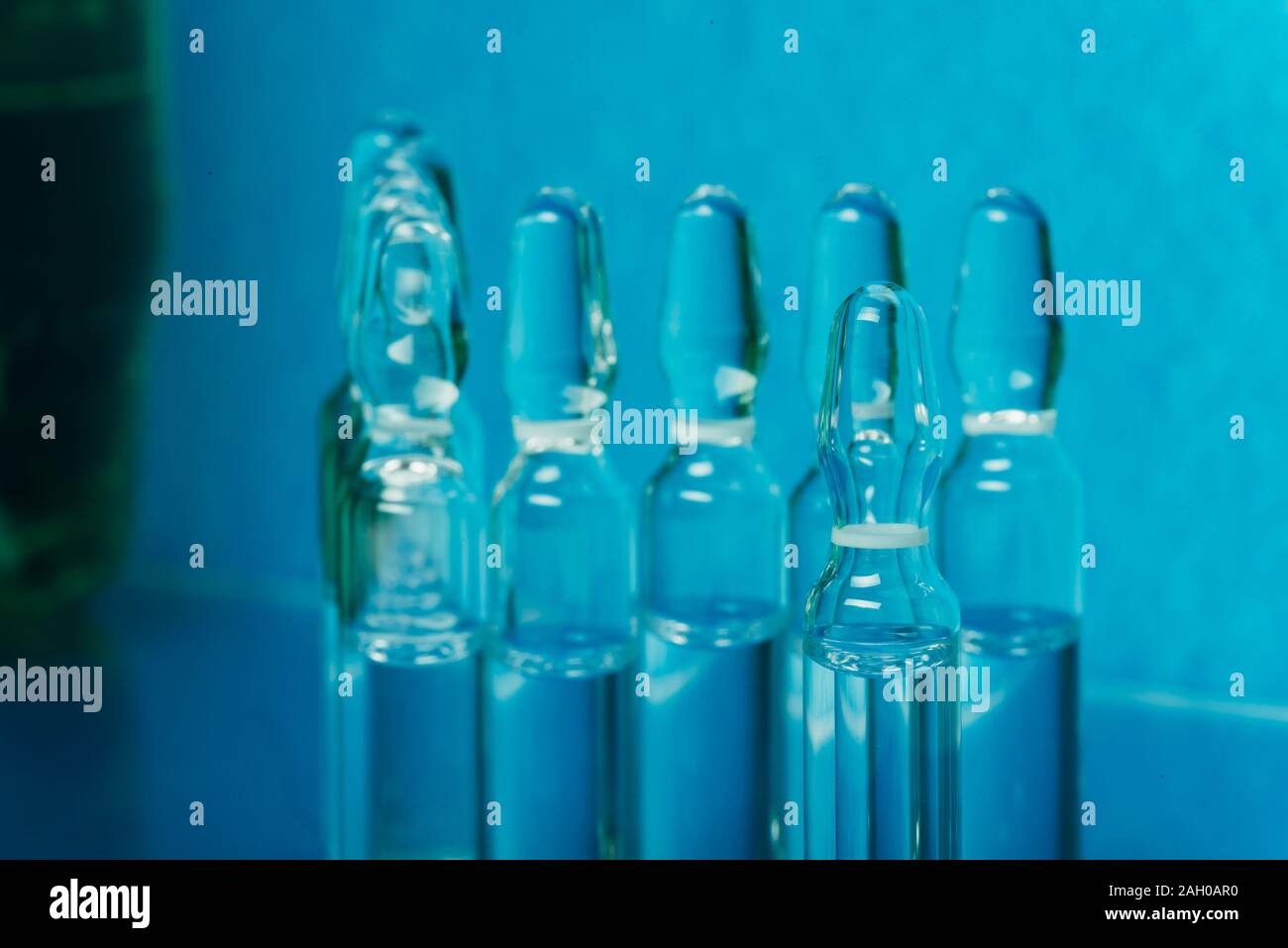 Glass medical ampoule vial for injection. Medicine is liquid sodium ...