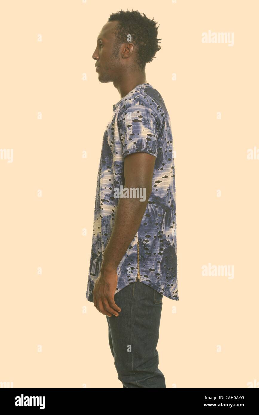 Profile view of young black African man Stock Photo - Alamy