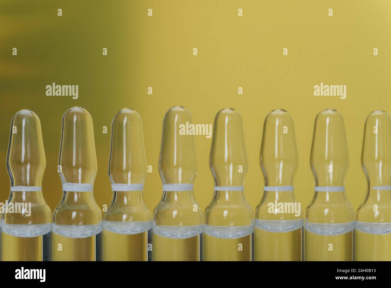 Glass medical ampoule vial for injection. Medicine is liquid sodium ...
