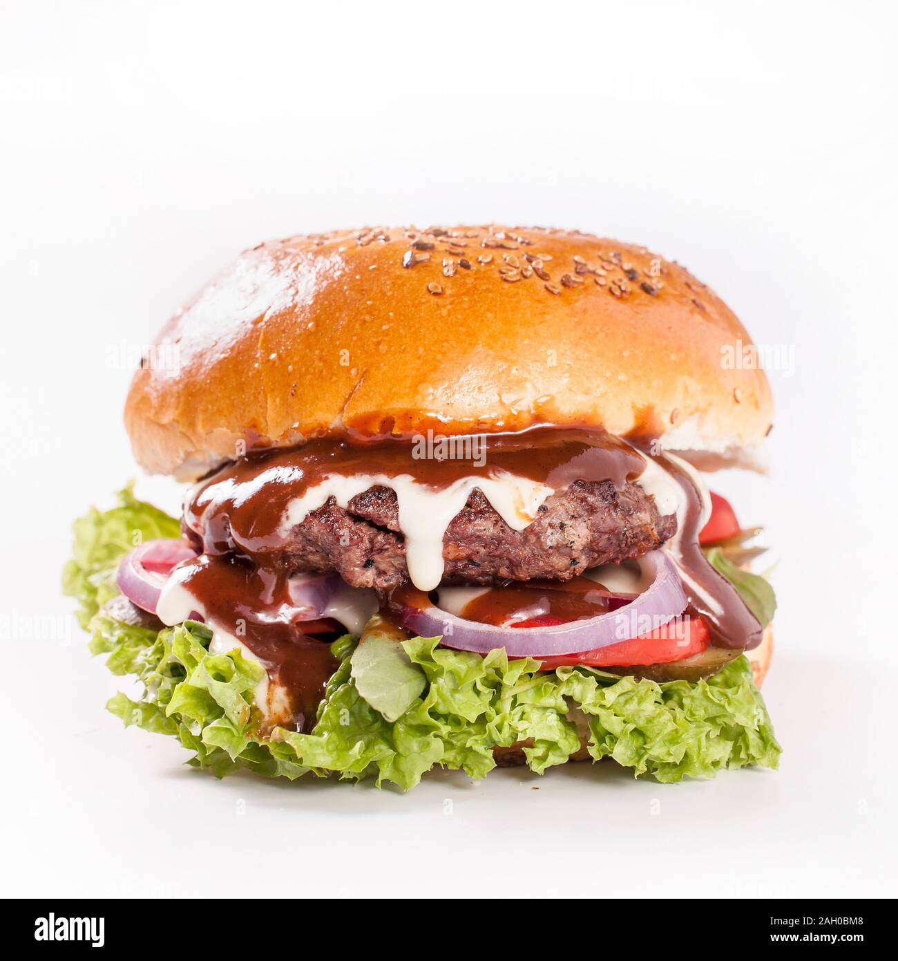 classic hamburger with souce and juice Stock Photo - Alamy