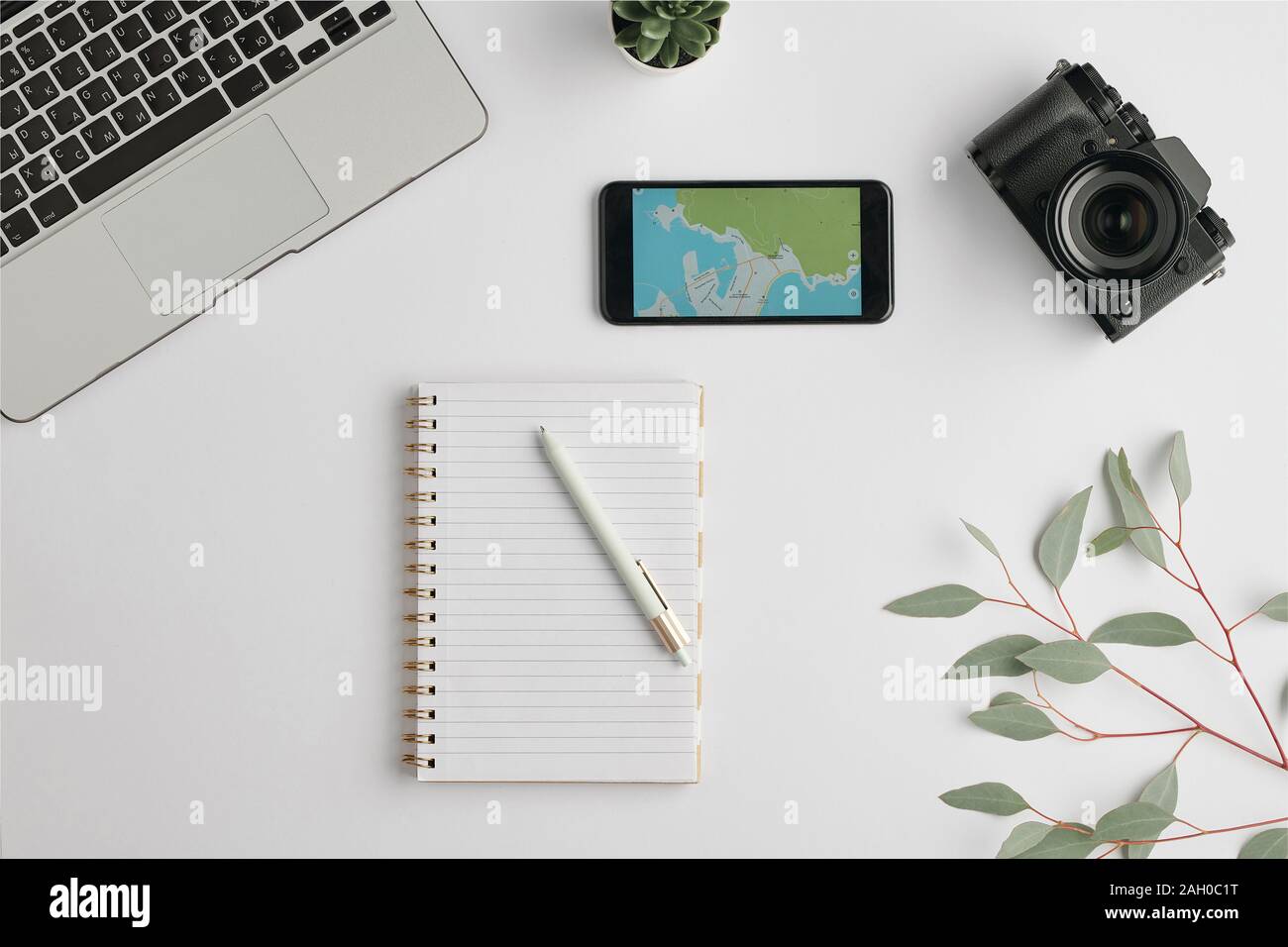 Flat layout of notebook with pen with smartphone, laptop and ...