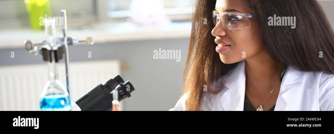 Black female chemist student conducting research Stock Photo - Alamy