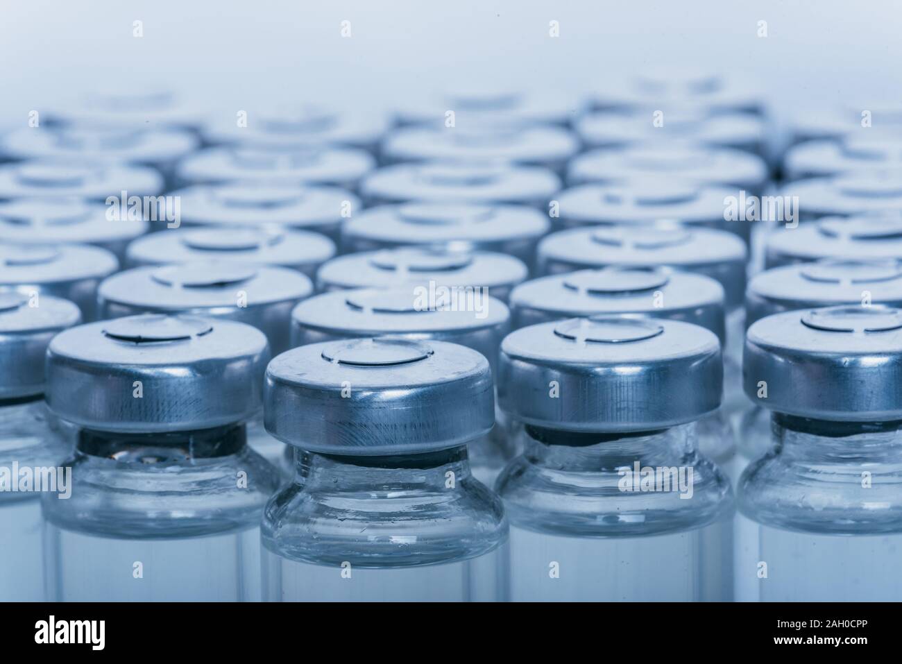 Glass medical ampoule vial for injection. Medicine is dry white drug ...