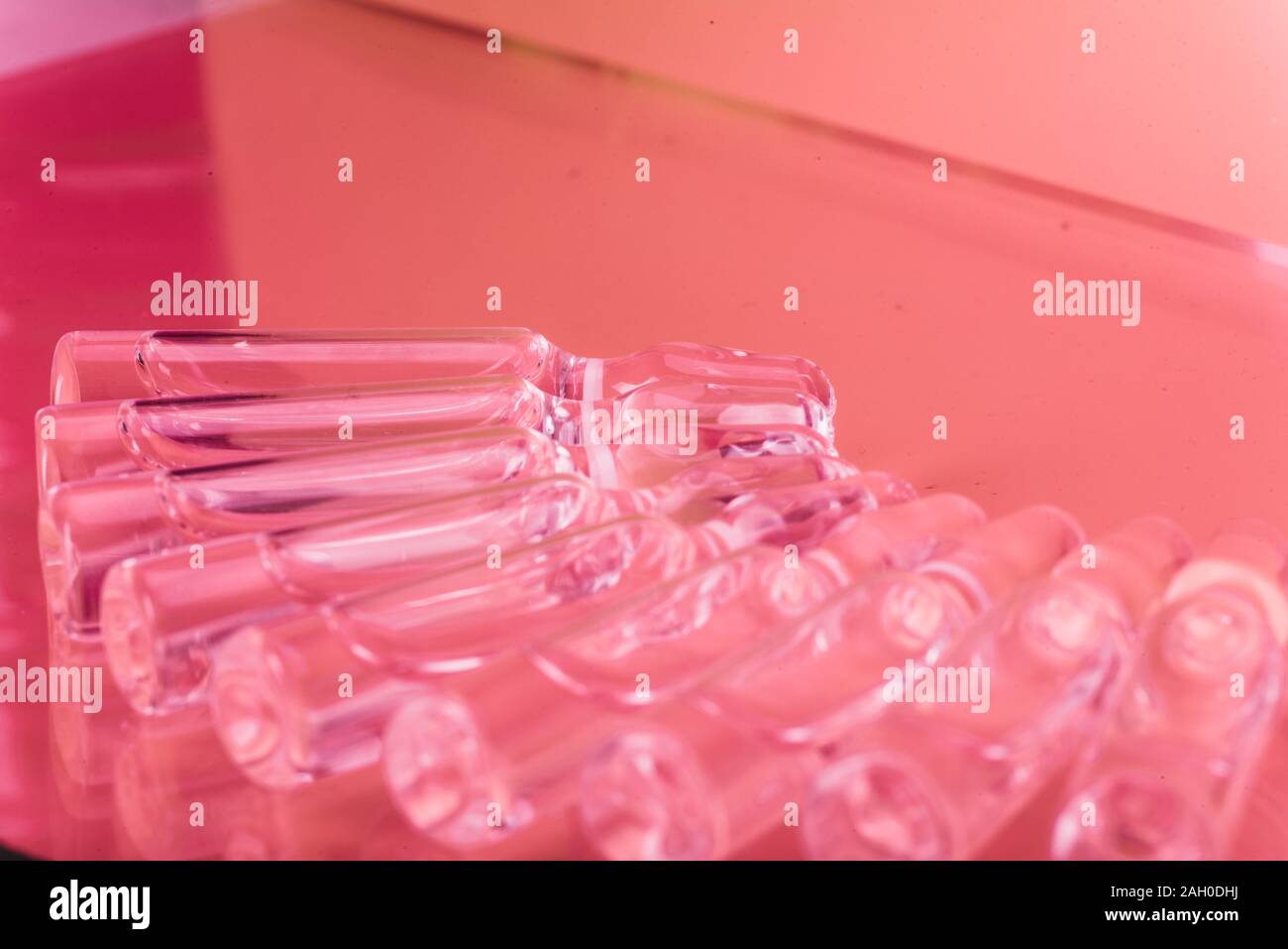 Glass medical ampoule vial for injection. Medicine is liquid sodium ...