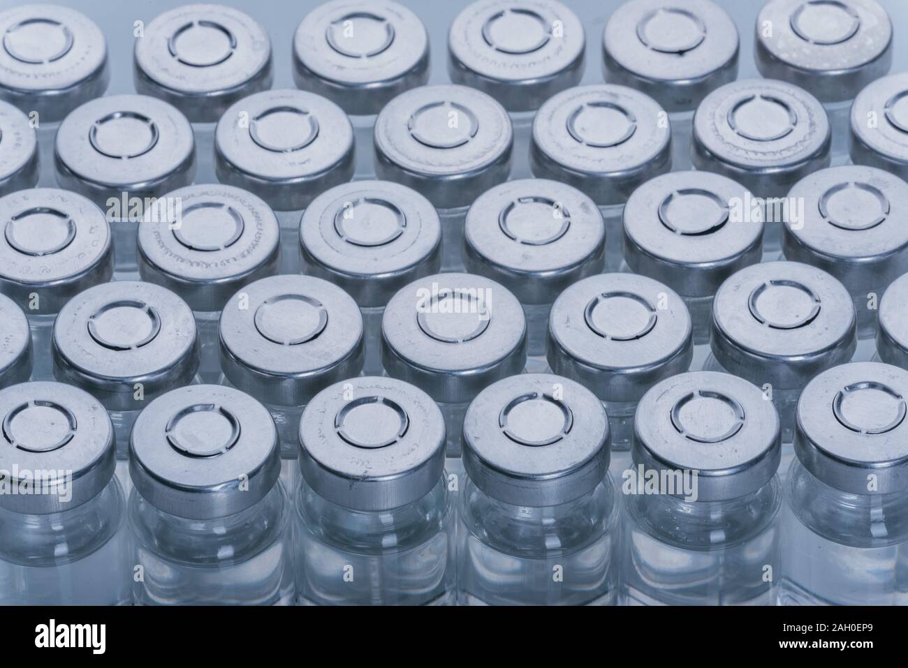 Glass medical ampoule vial for injection. Medicine is dry white drug ...