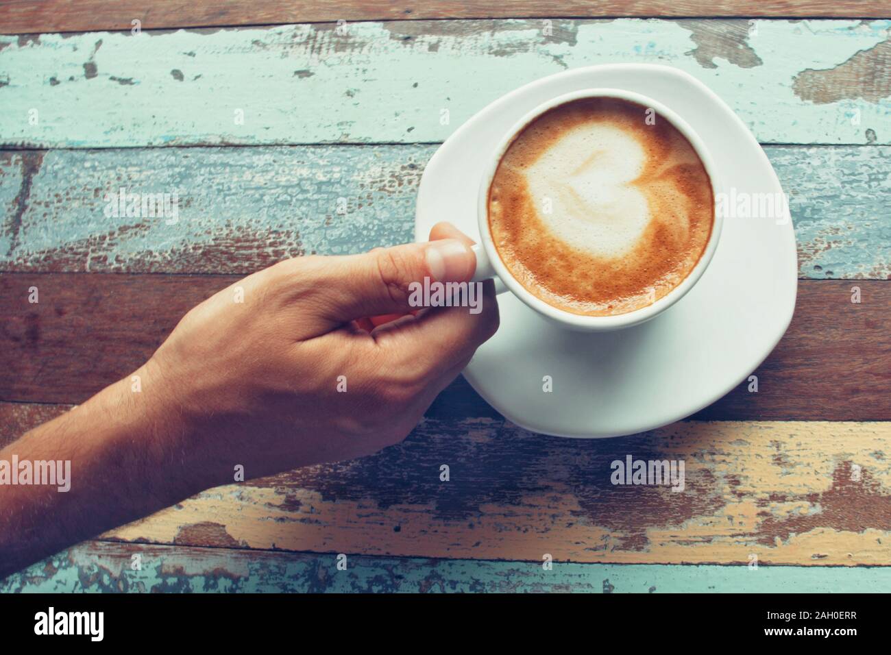 Hold a coffee cup hi-res stock photography and images - Alamy