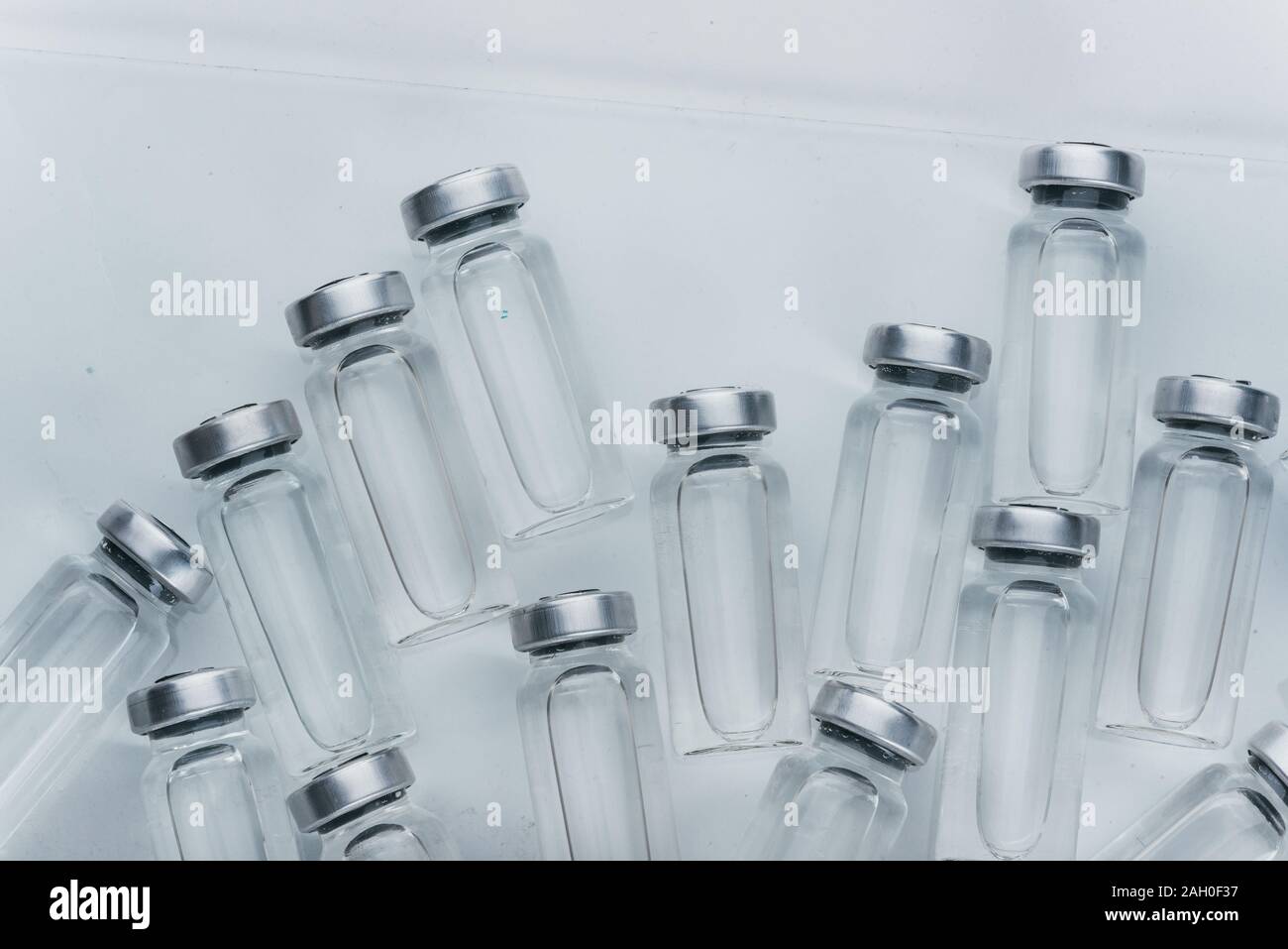 Glass medical ampoule vial for injection. Medicine is dry white drug ...