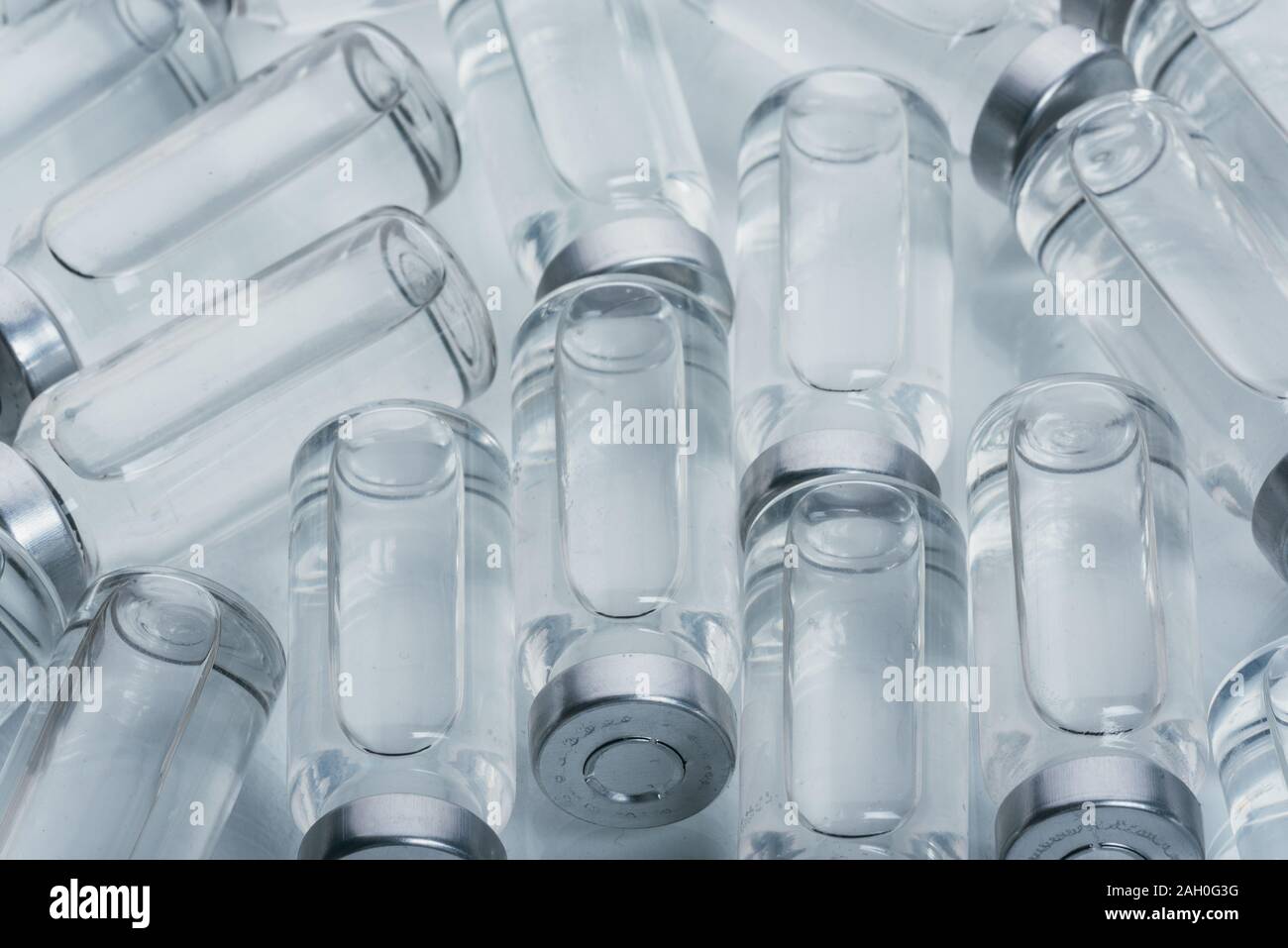 Glass medical ampoule vial for injection. Medicine is dry white drug ...