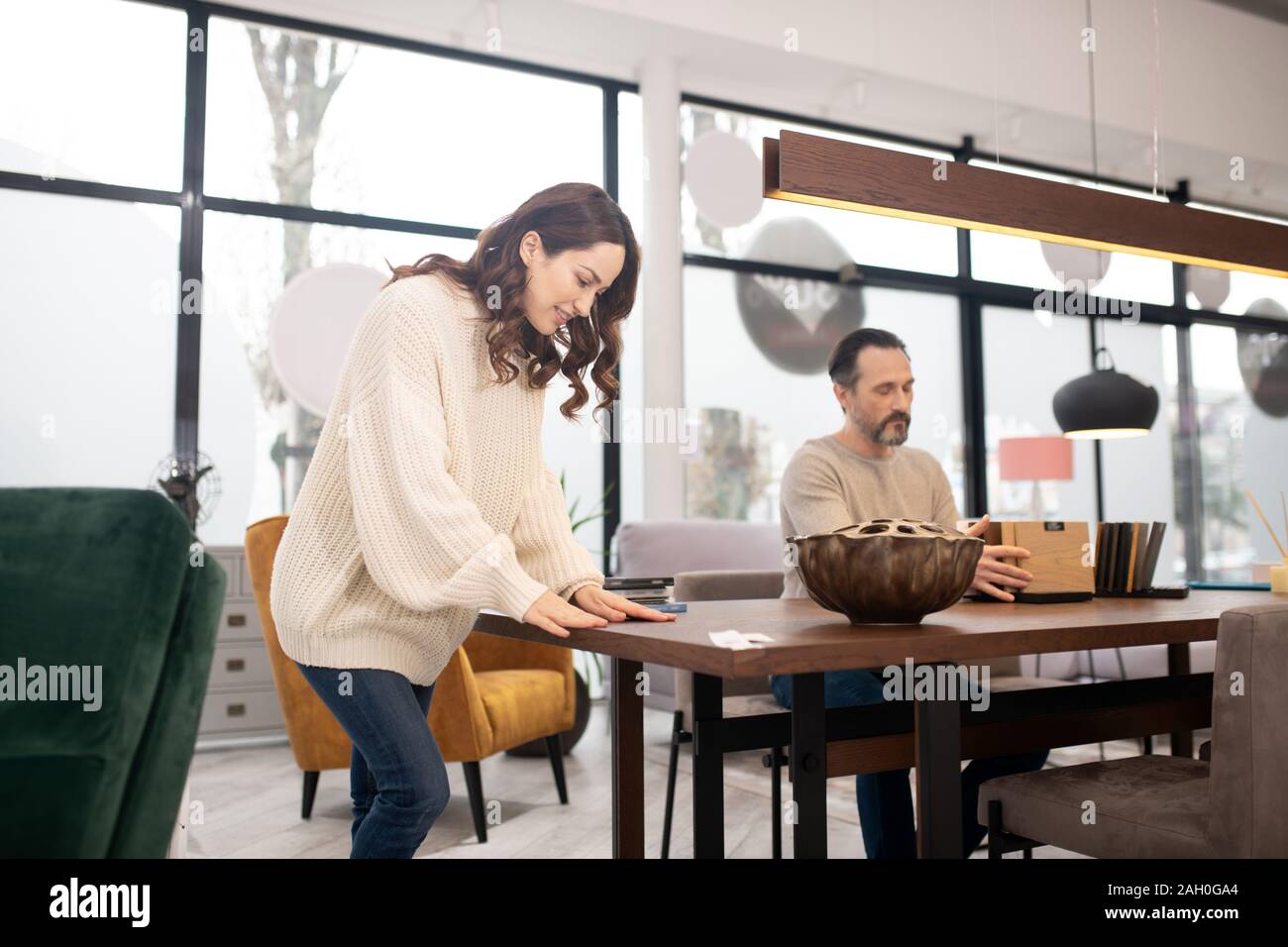 Woman touching surface interior hi-res stock photography and images - Alamy