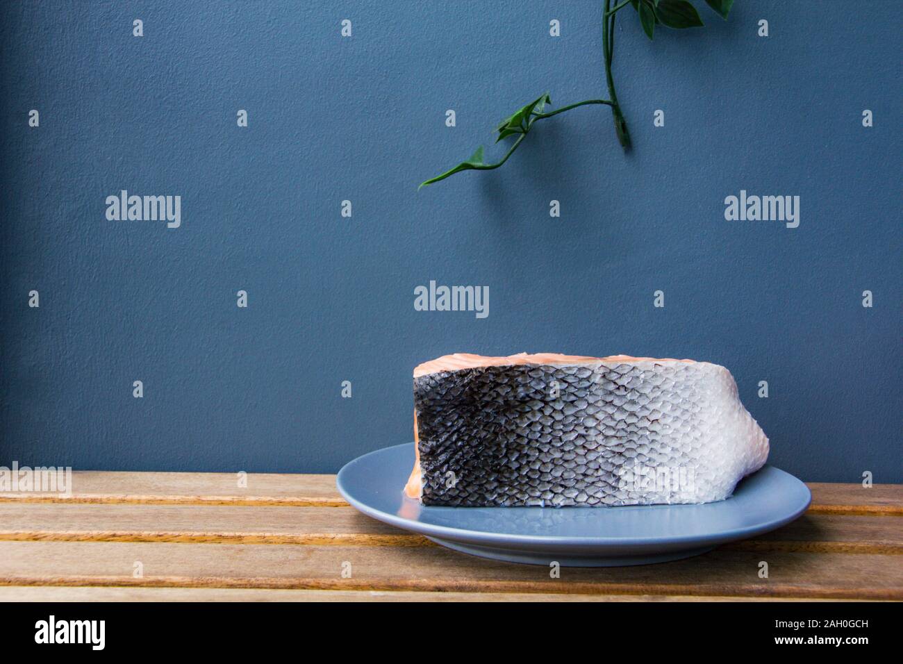 Salmon fresh fish on a plate Stock Photo - Alamy