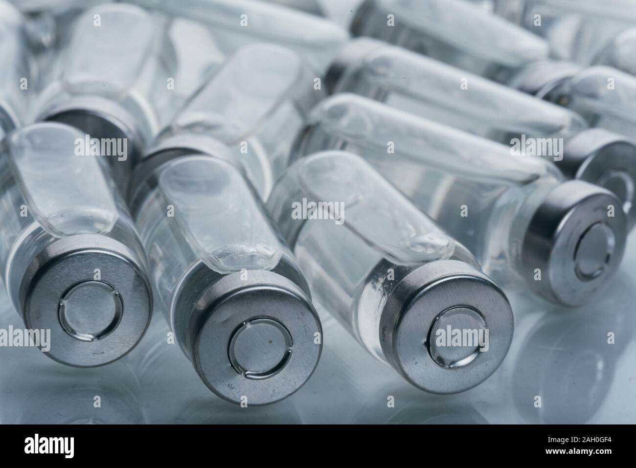 Glass medical ampoule vial for injection. Medicine is dry white drug ...