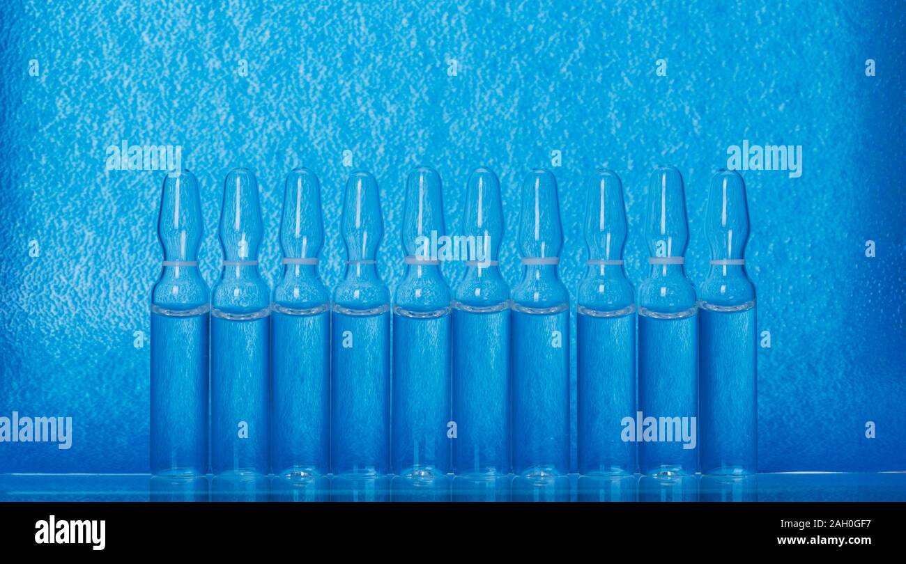 Glass medical ampoule vial for injection. Medicine is liquid sodium ...