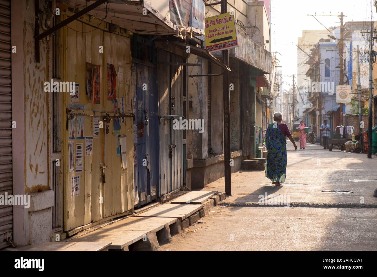 View of people in the street at sunrise,Trichy, Tamil Nadu, India Stock ...