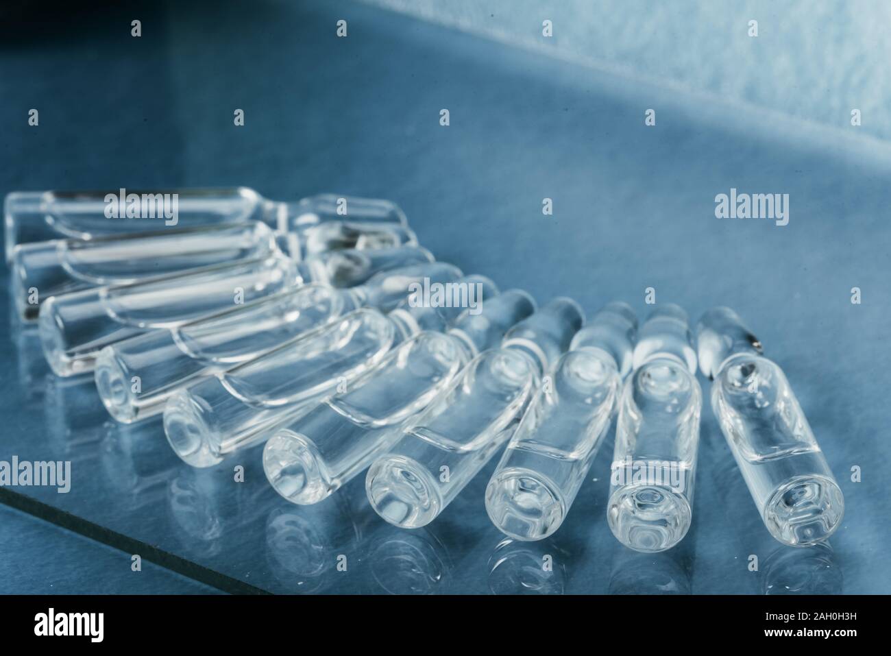 Glass medical ampoule vial for injection. Medicine is liquid sodium ...