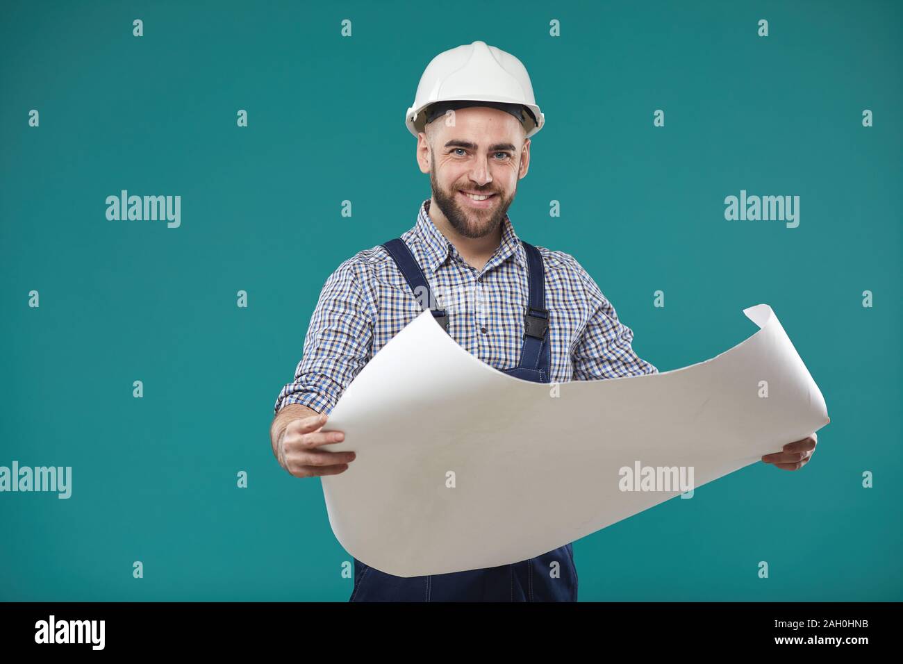 Horizontal studio portrait of Caucasian male construction engineer ...