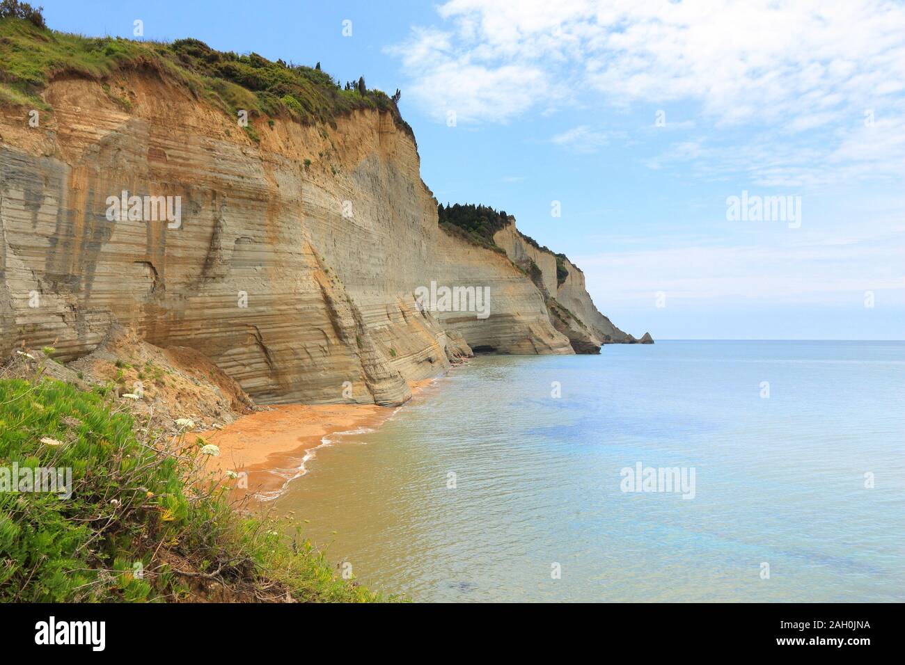 Corfu beach landscape - island in Greece. Logas Beach below the cliffs ...