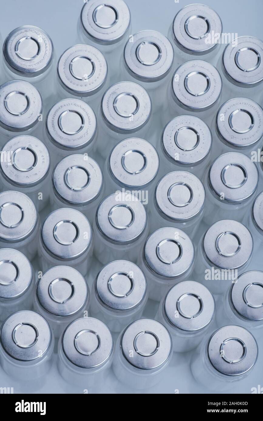 Glass medical ampoule vial for injection. Medicine is dry white drug ...