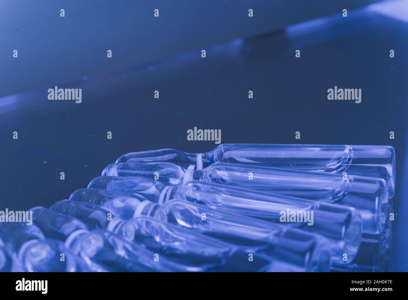 Glass medical ampoule vial for injection. Medicine is liquid sodium ...